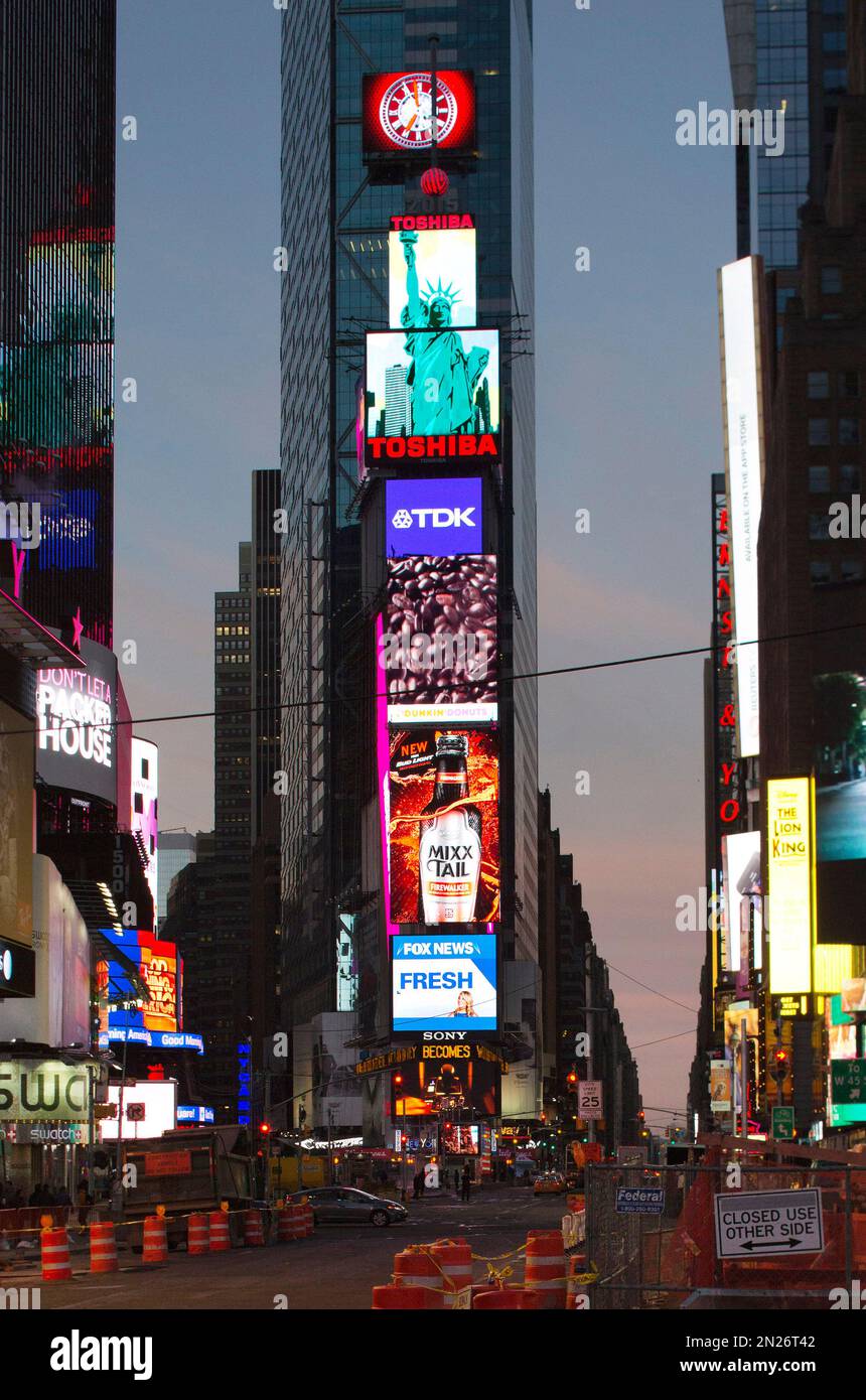 FILE - In this March 19, 2015 file photo, electronic billboards light ...