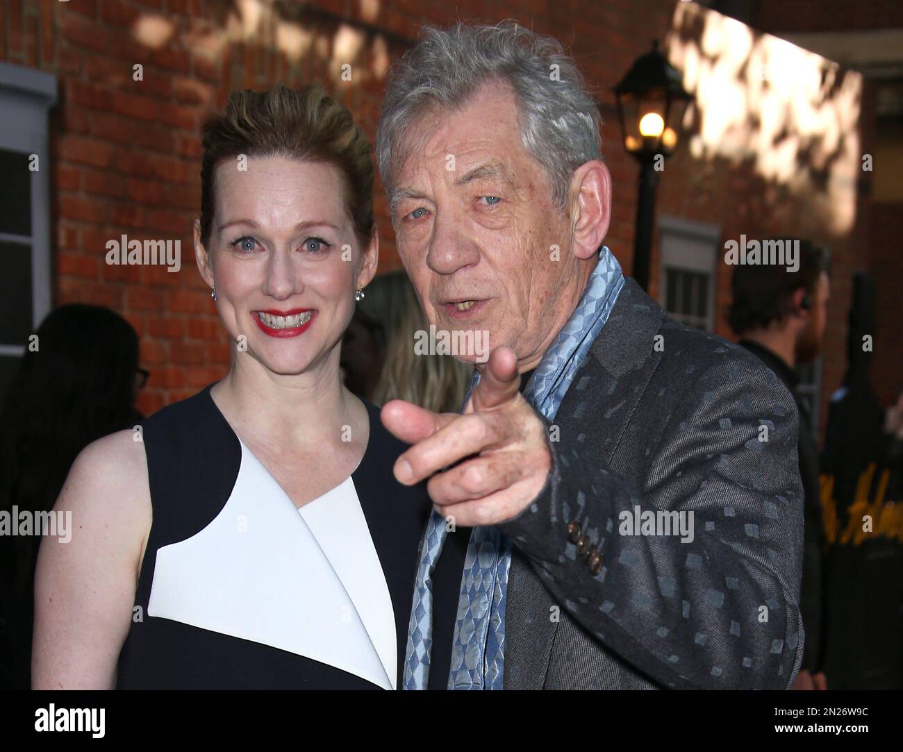 Laura Linney and Sir Ian McKellen pose for photographers upon arrival ...