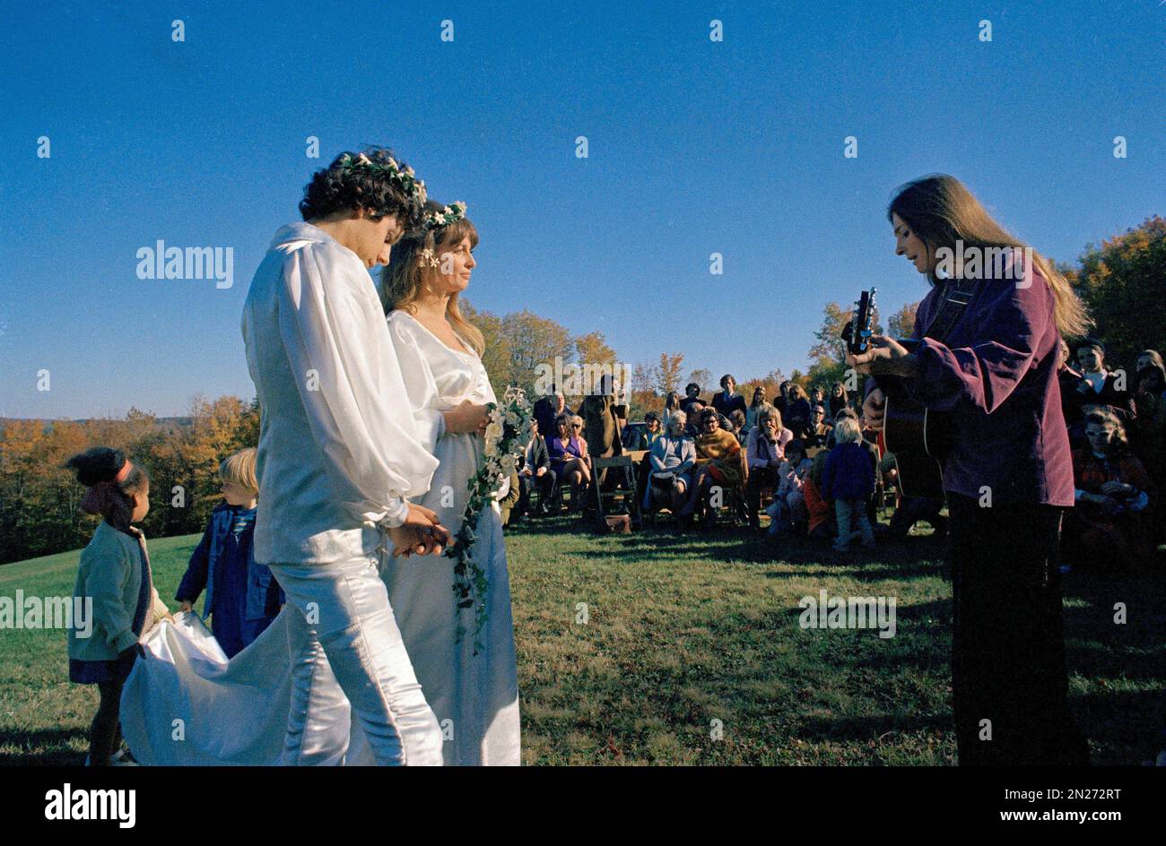 Folk singer Arlo Guthrie, left, and his bride Jackie Hyde are pictured ...
