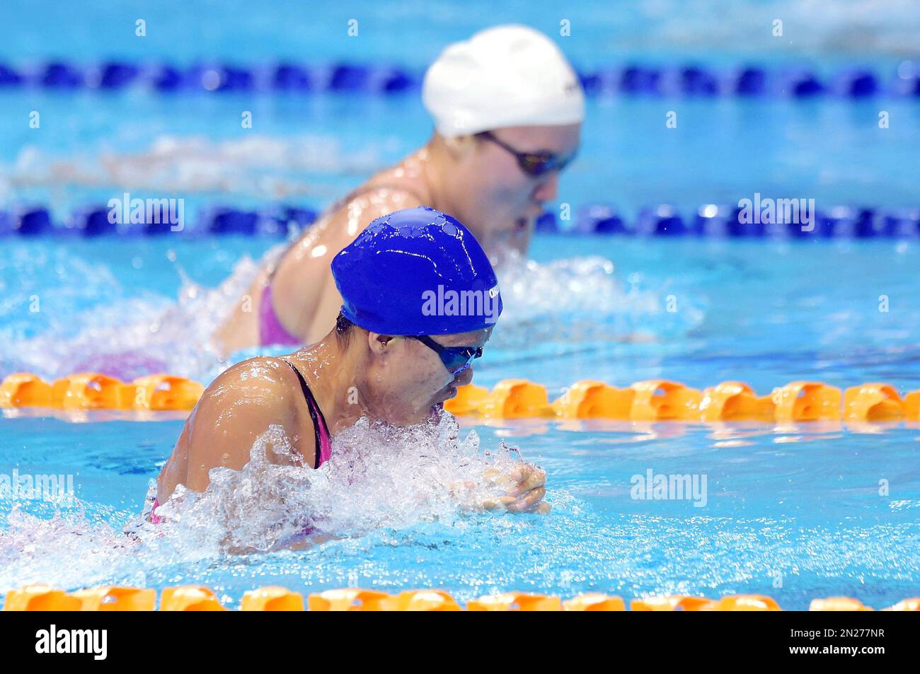 Phee Jin En of Malaysia, bottom, and Roanne Ho Ru’En, of Singapore ...