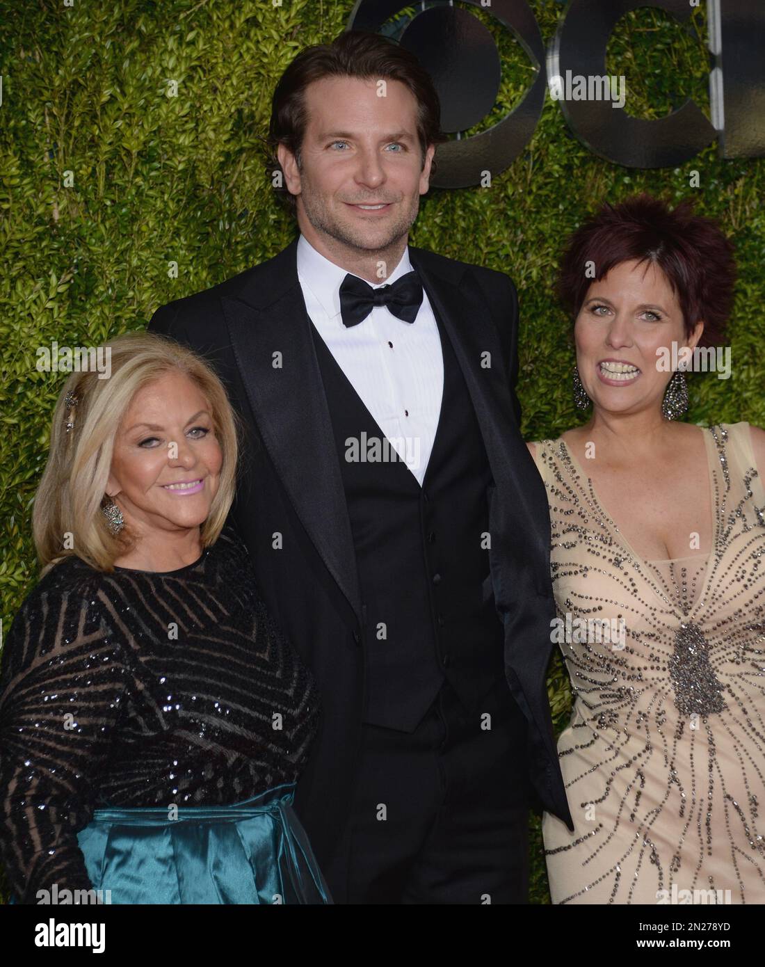 Gloria Campano, left, Bradley Cooper, and Holly Cooper arrive at the ...