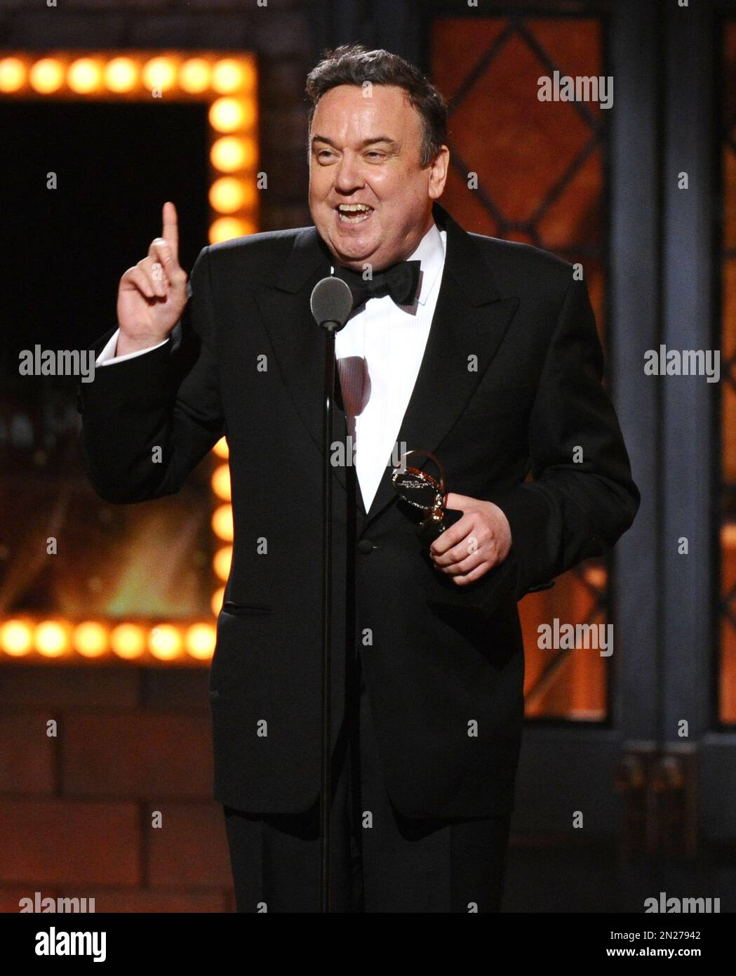 Richard McCabe accepts the award for best performance by an actor in a ...