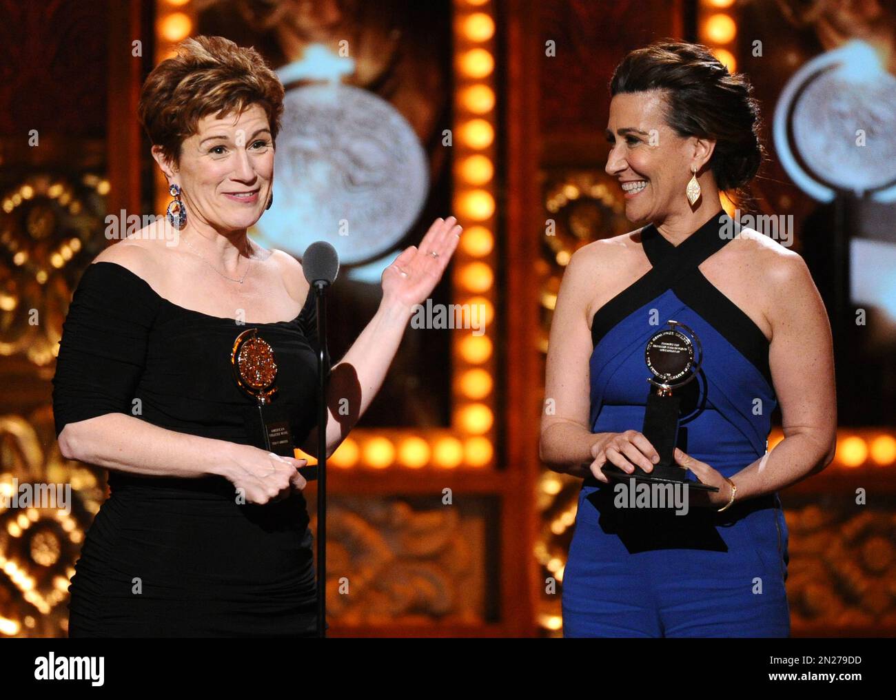 Lisa Kron, left, and Jeanine Tesori accept the award for best score for ...