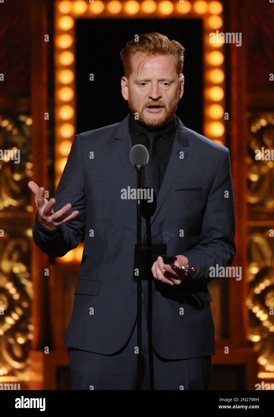 Christopher Oram accepts the award for best costume design of a play ...