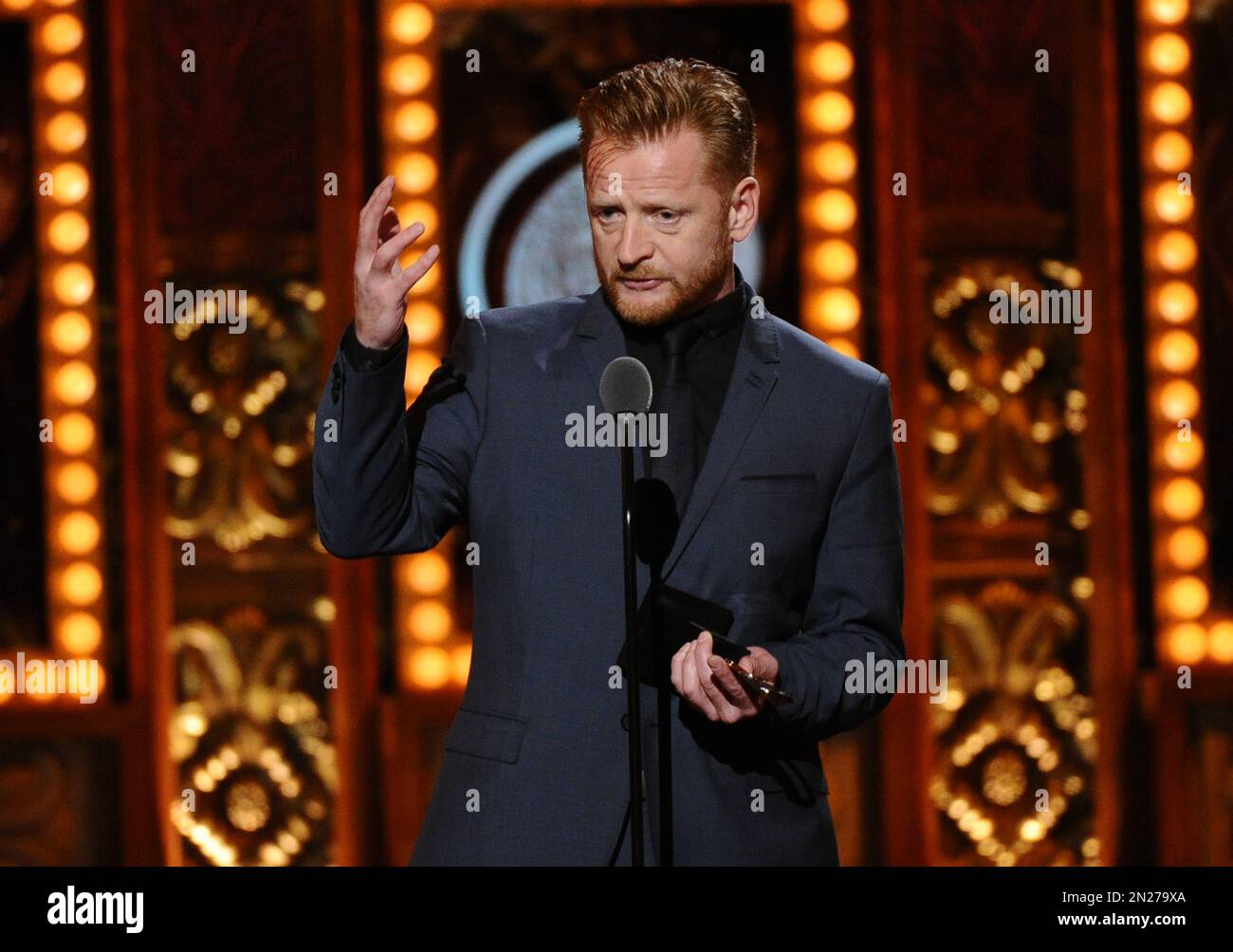 Christopher Oram accepts the award for best costume design of a play ...