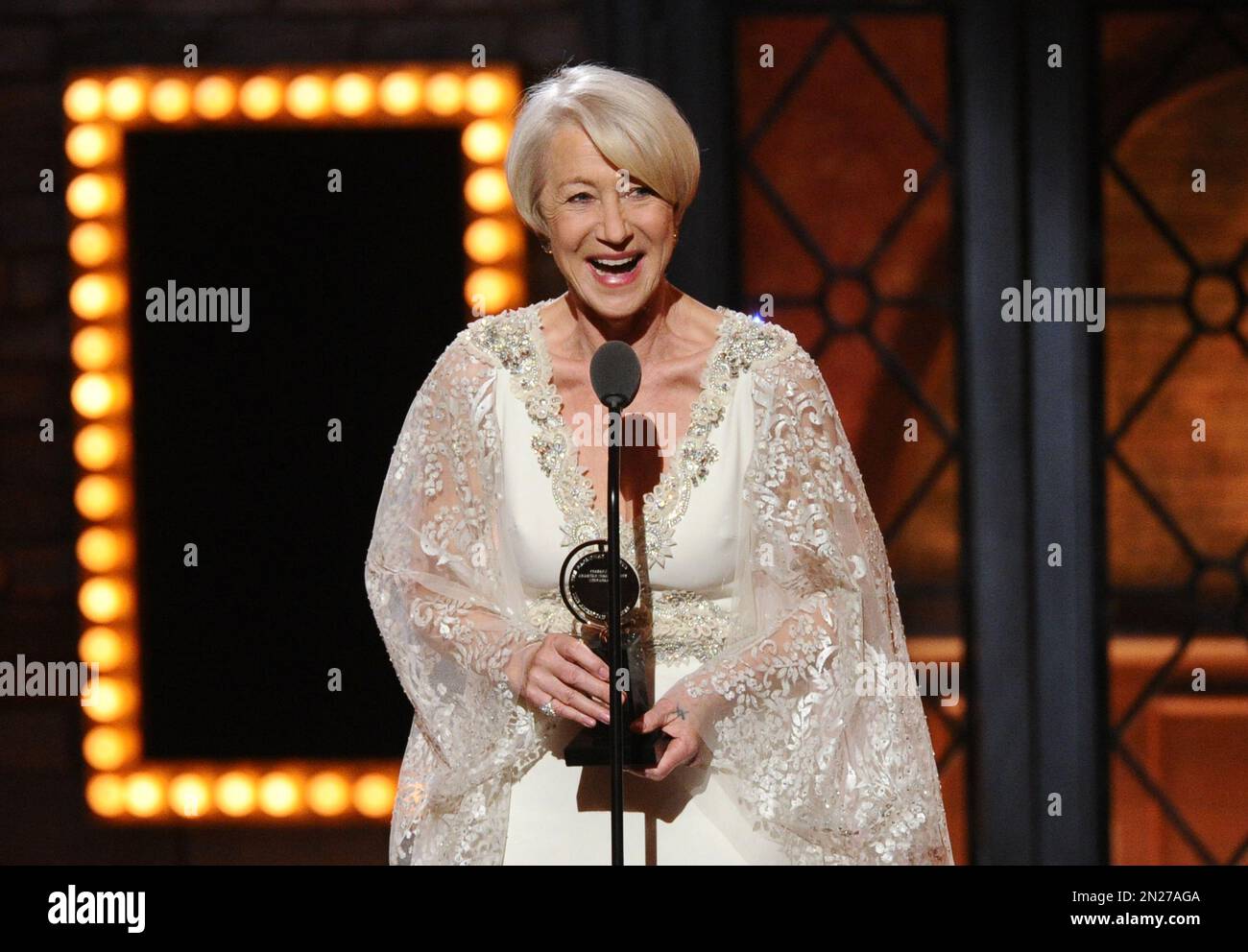 Helen Mirren accepts the award for performance by an actress in a ...