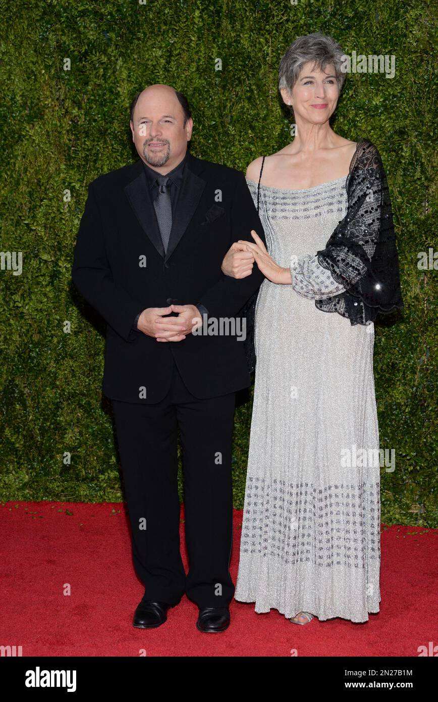 Jason Alexander, left, and Daena E. Title arrive at the 69th annual ...