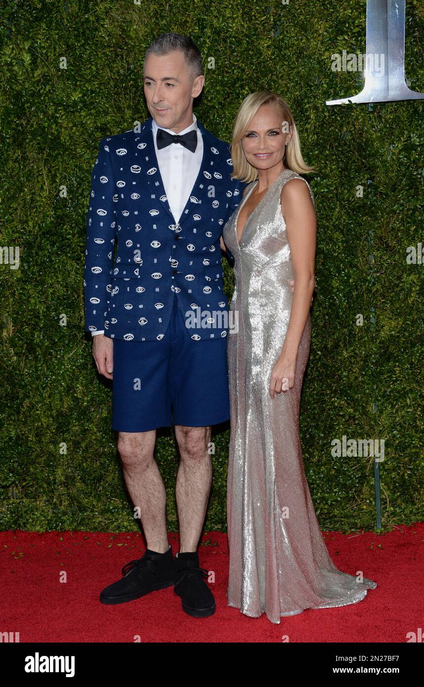 Alan Cumming, left, and Kristin Chenoweth arrive at the 69th annual ...