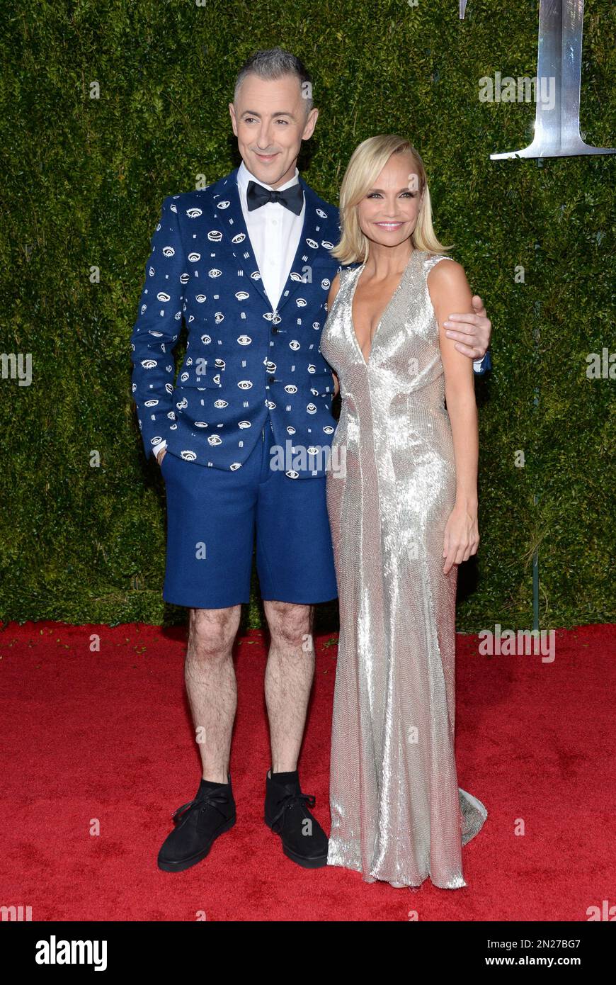Alan Cumming, left, and Kristin Chenoweth arrive at the 69th annual ...