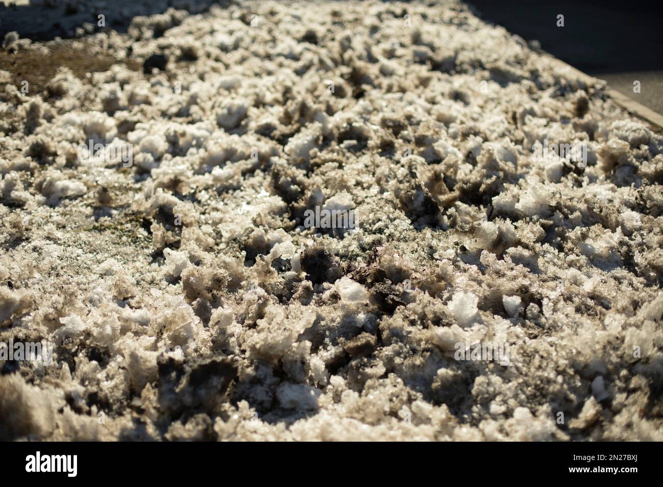 Melt on lawn. Precipitation after snowstorm. Hail fell outside. Weather ...