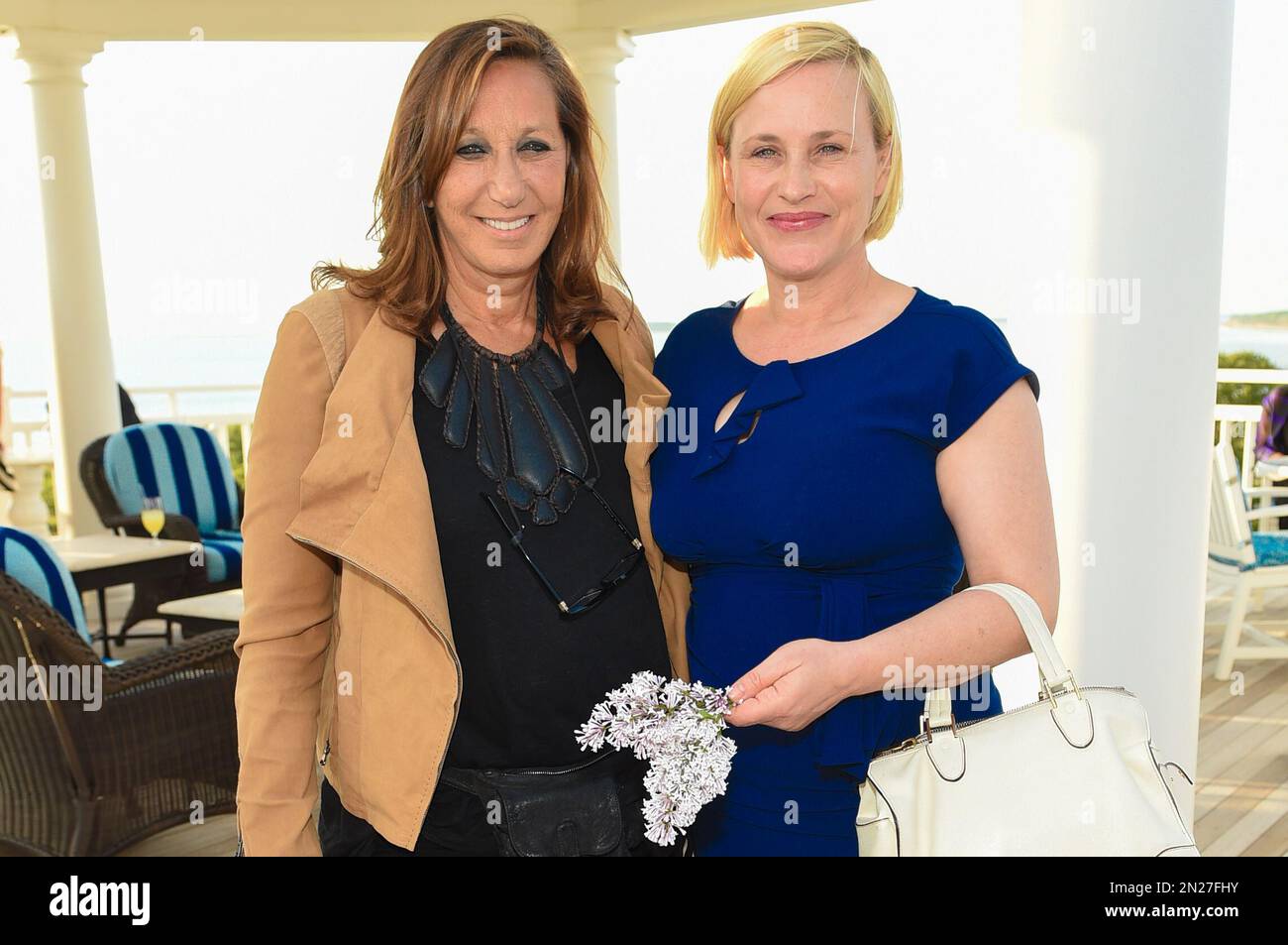 Fashion designer Donna Karan, left, and actress Patricia Arquette ...