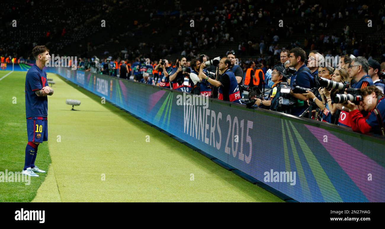 Barcelona's Lionel Messi stands on the side of the pitch after the ...