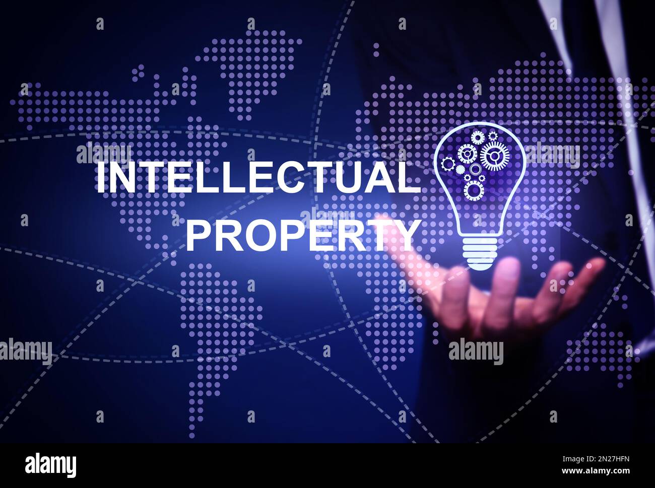 Intellectual property concept. Man with light bulb and world map ...