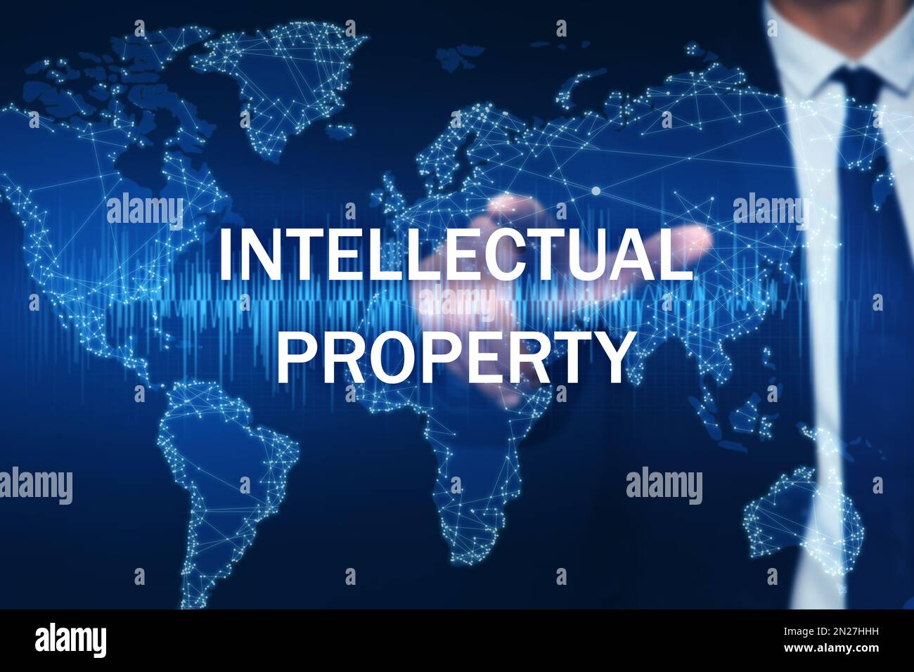 Intellectual property concept. Man using virtual screen with world map ...