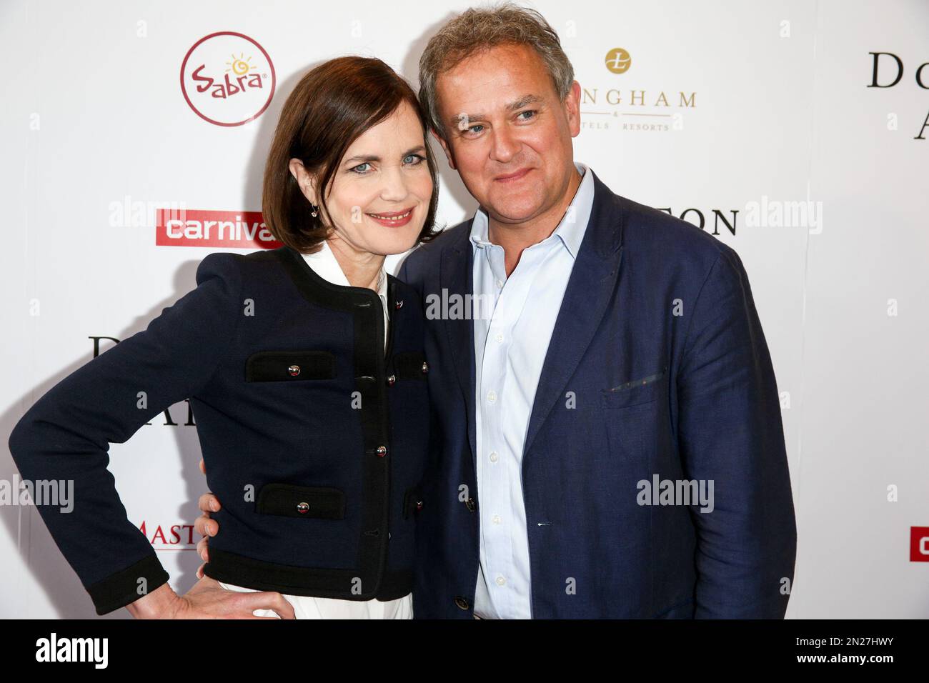 Elizabeth McGovern, left, and Hugh Bonneville arrive at An Afternoon ...