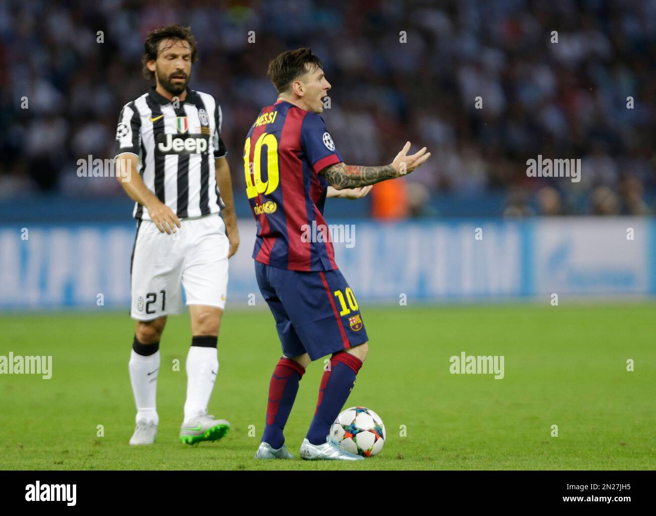 Barcelona's Lionel Messi reacts alongside Juventus' Andrea Pirlo after ...