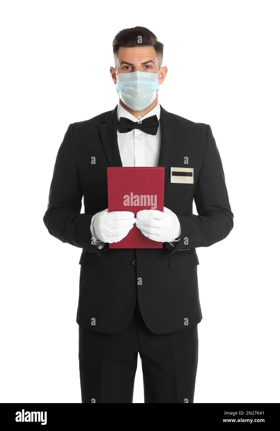 Waiter in medical face mask with menu on white background Stock Photo ...