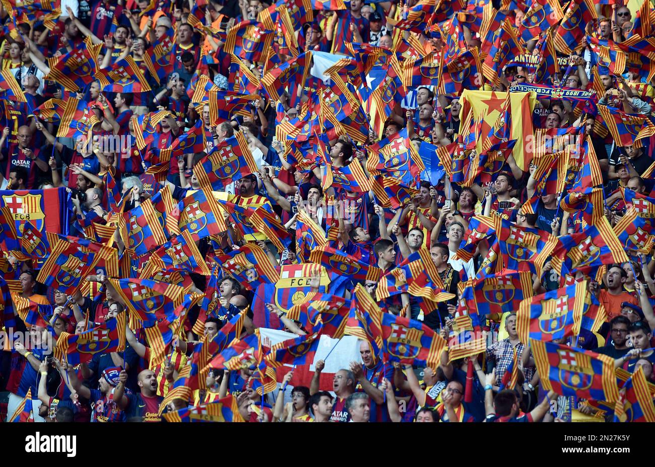 Barcelona fans cheer prior to the Champions League final soccer match ...