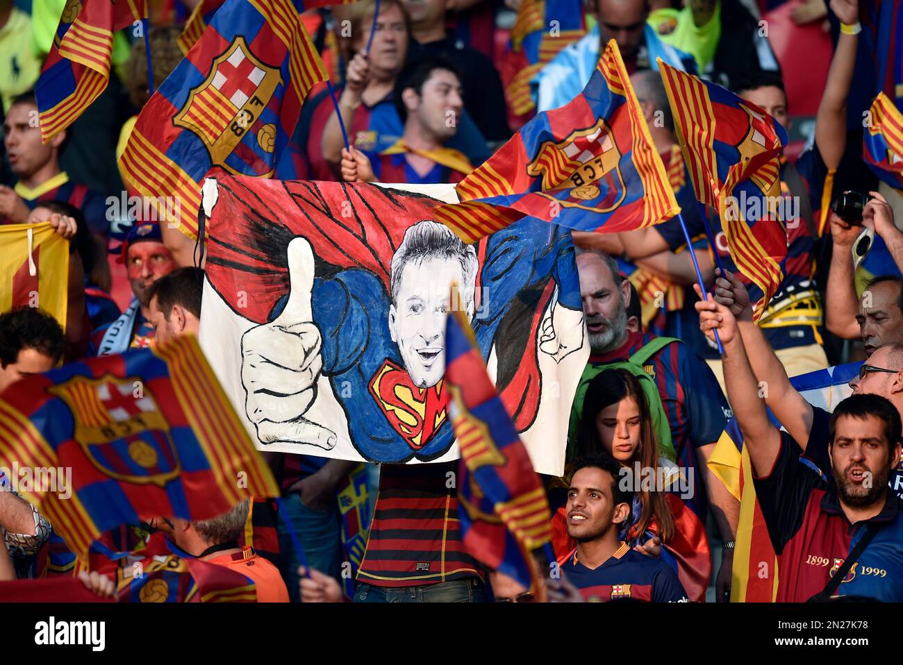 Barcelona fans cheer prior to the Champions League final soccer match ...