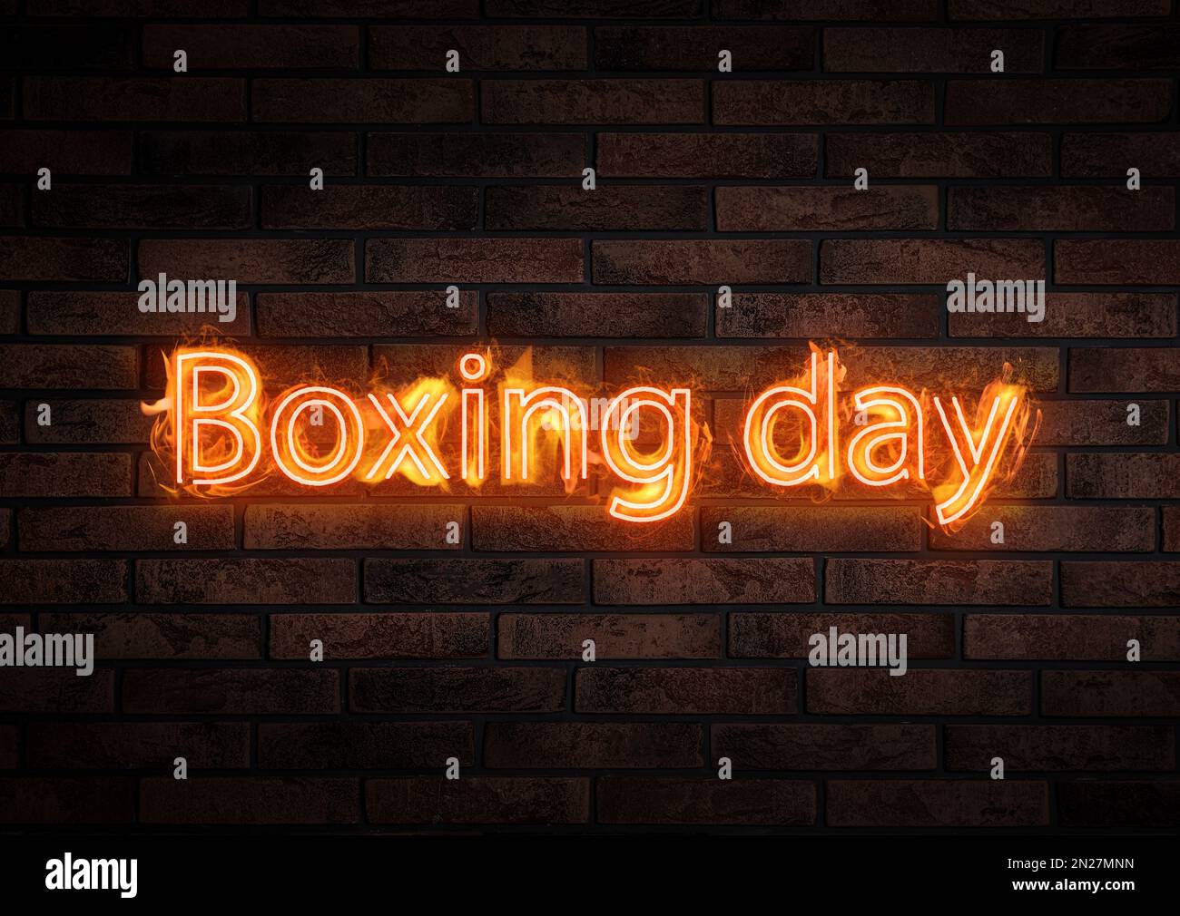 Flaming text Boxing Day against brick wall Stock Photo - Alamy