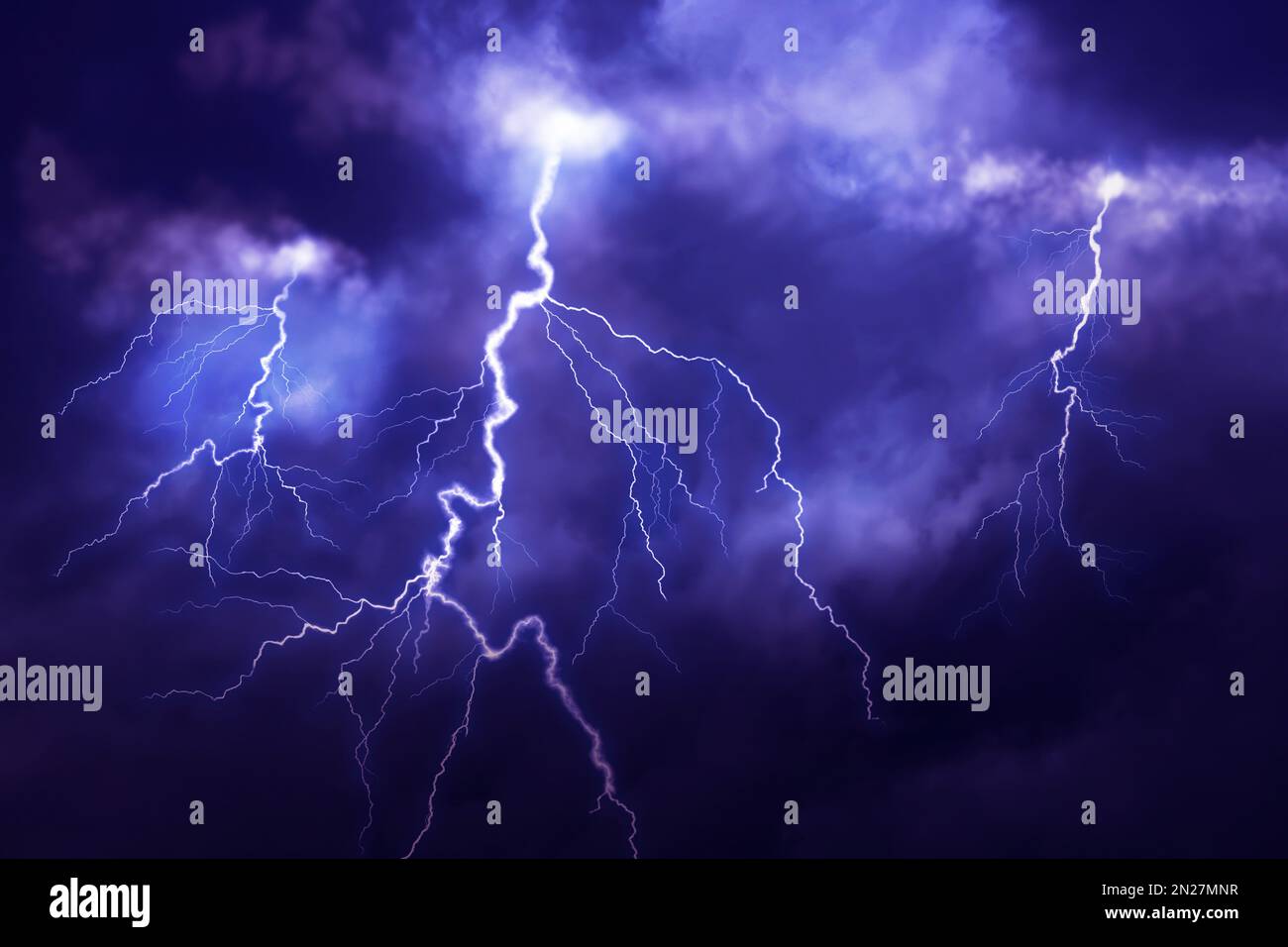 Lightnings in dark cloudy sky during thunderstorm Stock Photo - Alamy