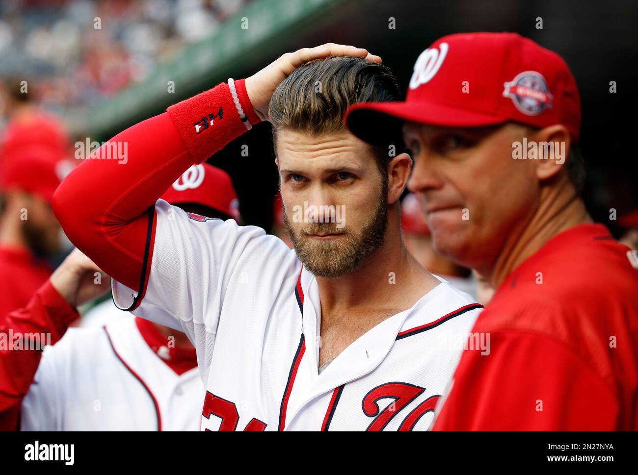 Washington Nationals right fielder Bryce Harper walks in the dugout ...