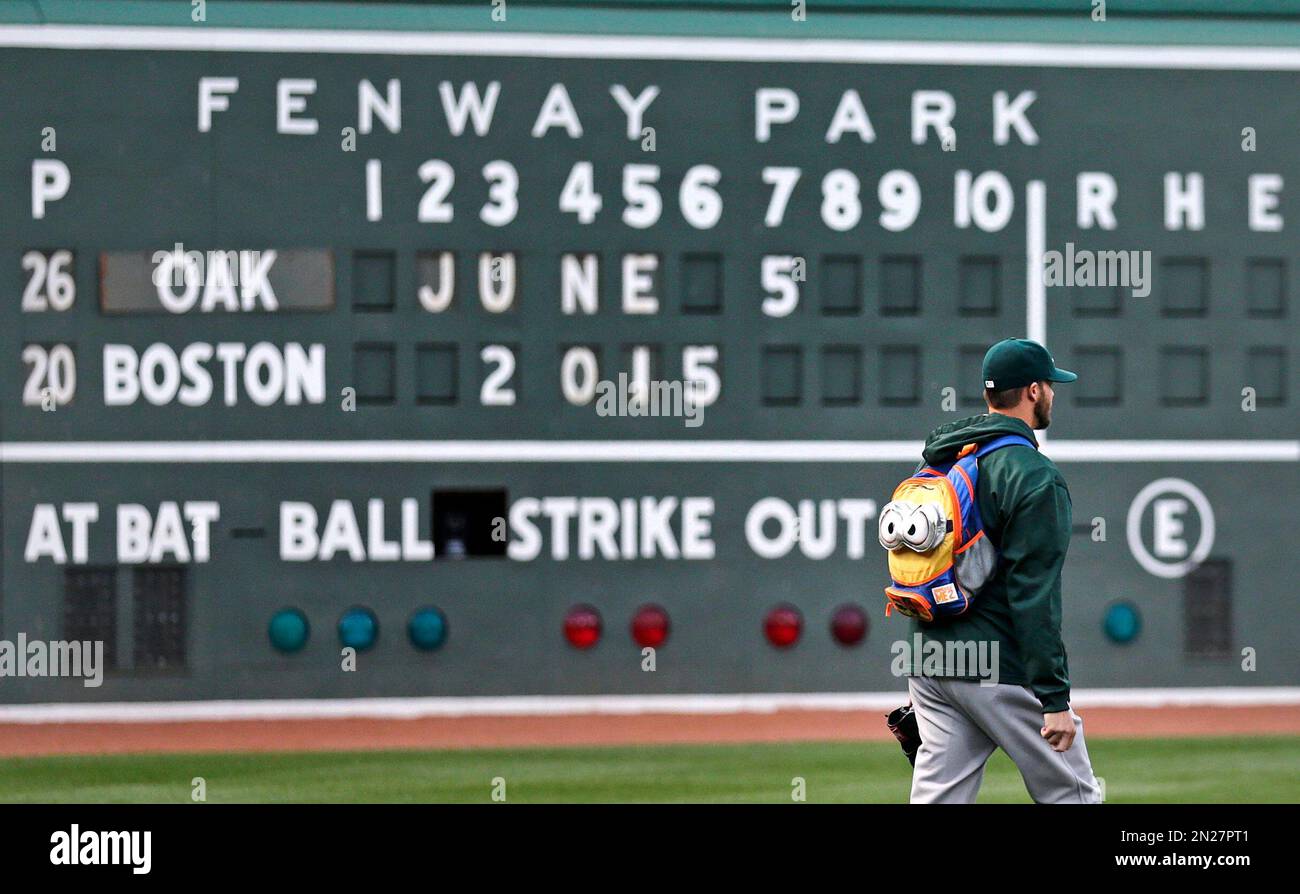 Oakland Athletics relief pitcher Evan Scribner wears a "minion ...
