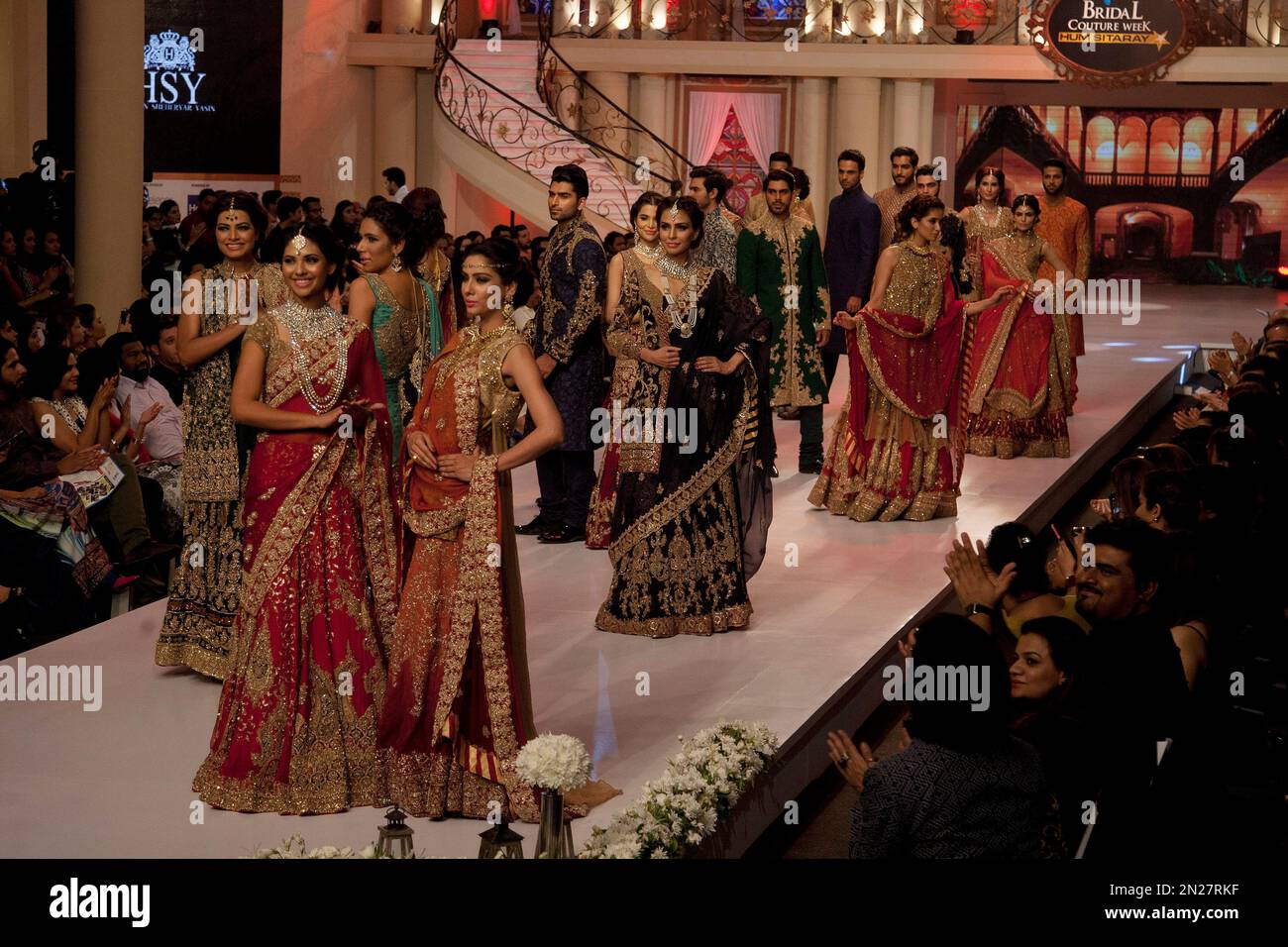 Models present creations by Pakistani designer HSY at Bridal Couture ...