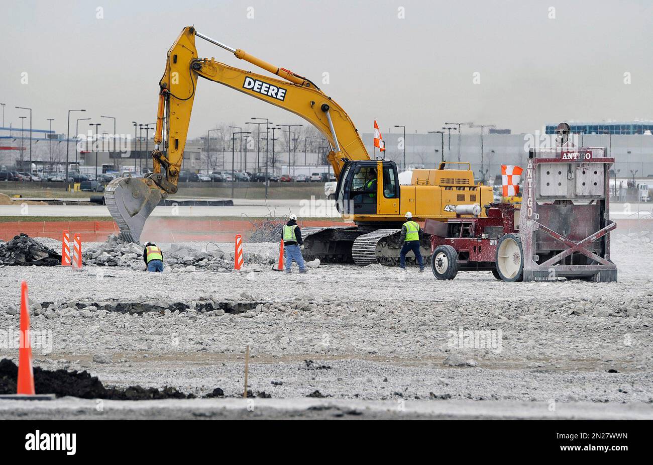 FILE - In this March 24, 2010, file photo, construction crews work on ...