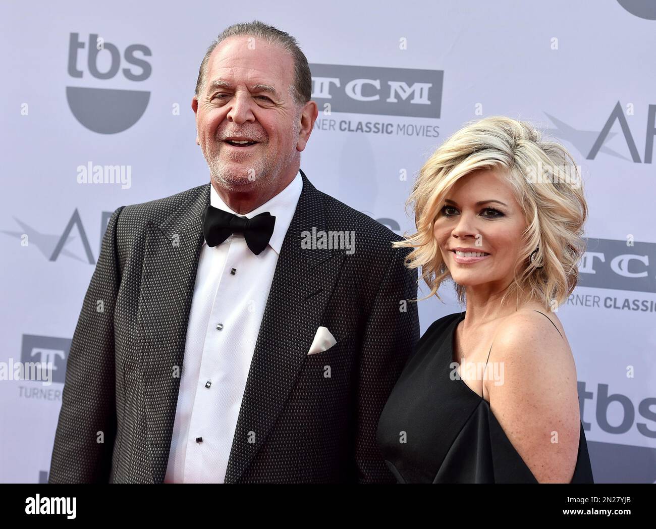 Richard Frank, AFI board of trustees vice chair, left , and Leslie ...