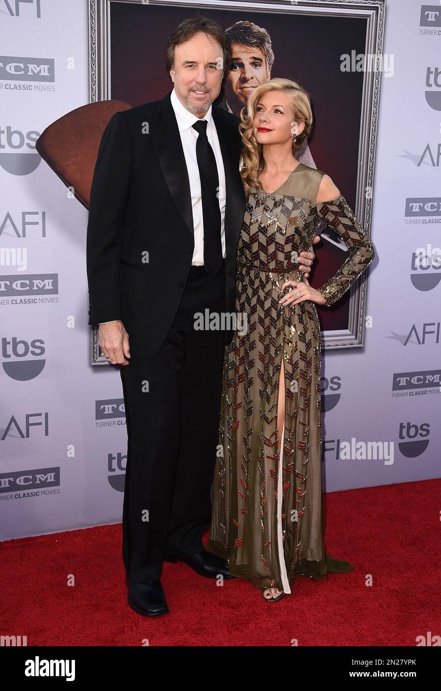 Kevin Nealon left, and Susan Yeagley arrive at the 43rd AFI Lifetime ...
