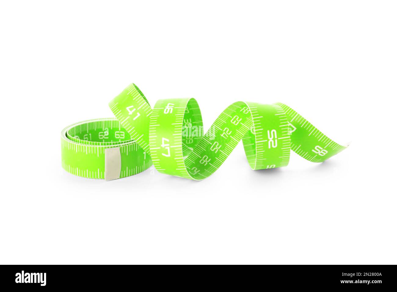 New green measuring tape isolated on white Stock Photo - Alamy