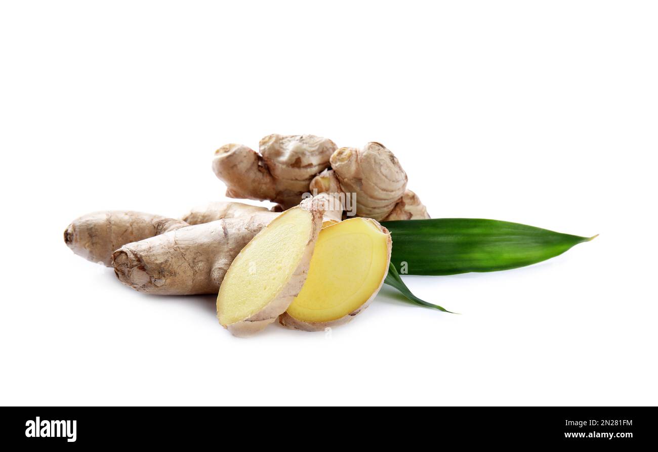 Whole and cut fresh ginger with leaves isolated on white Stock Photo ...