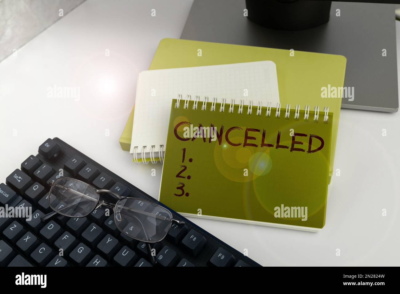 Hand writing sign Cancelled. Conceptual photo decide or announce that ...