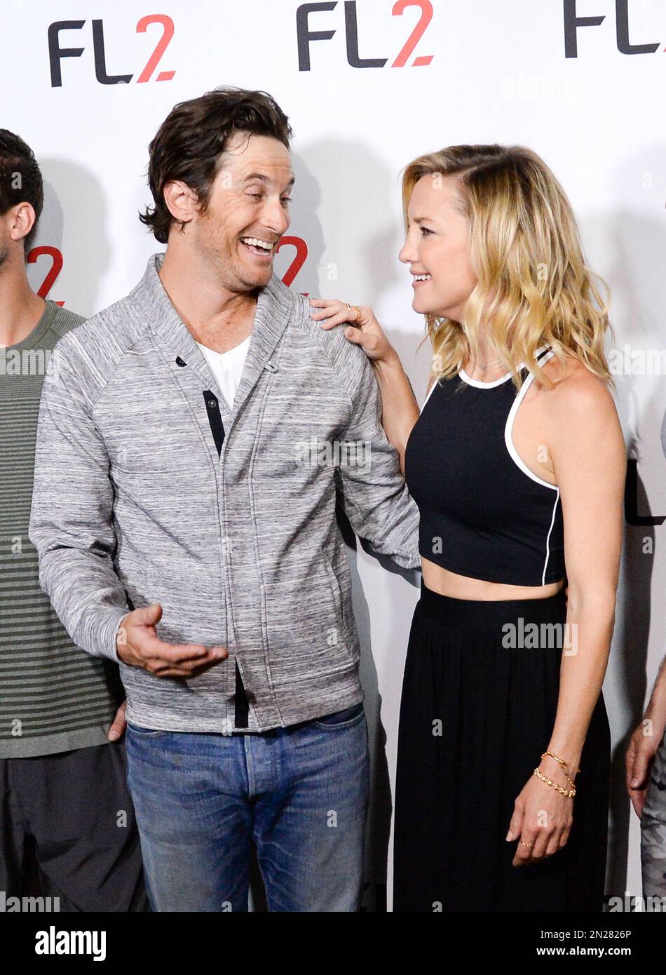 FABLETICS co-founder Kate Hudson, right, and FL2 spokesperson Oliver ...