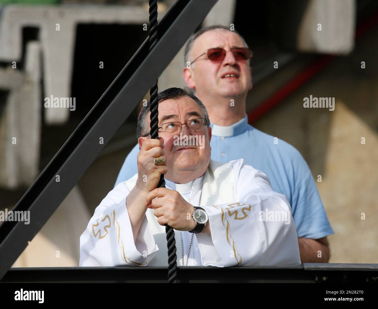 Head of Catholic church in Bosnia cardinal Vinko Puljic visiting altar ...