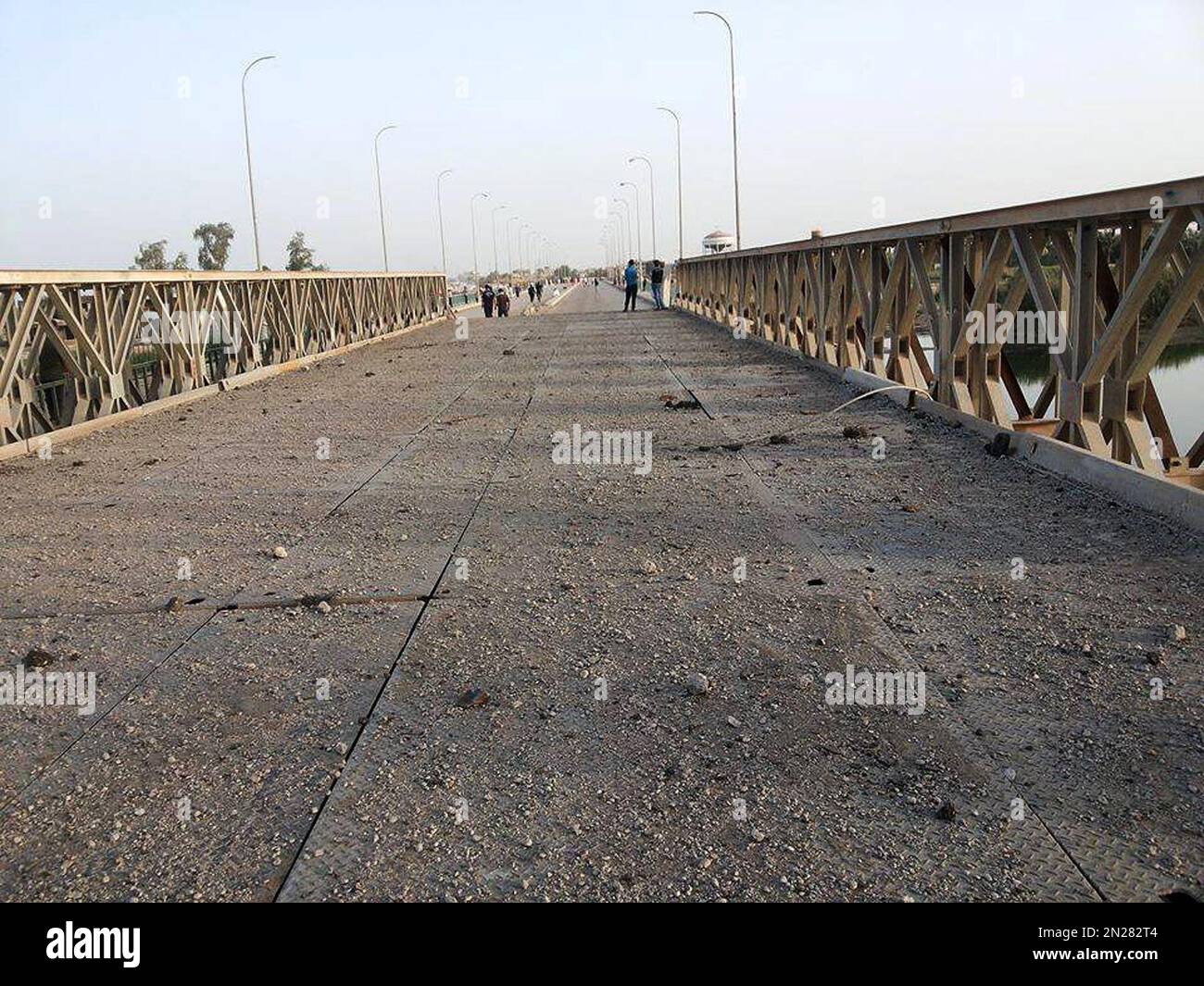 In this photo taken Wednesday, June 3, 2015, people visit a destroyed ...