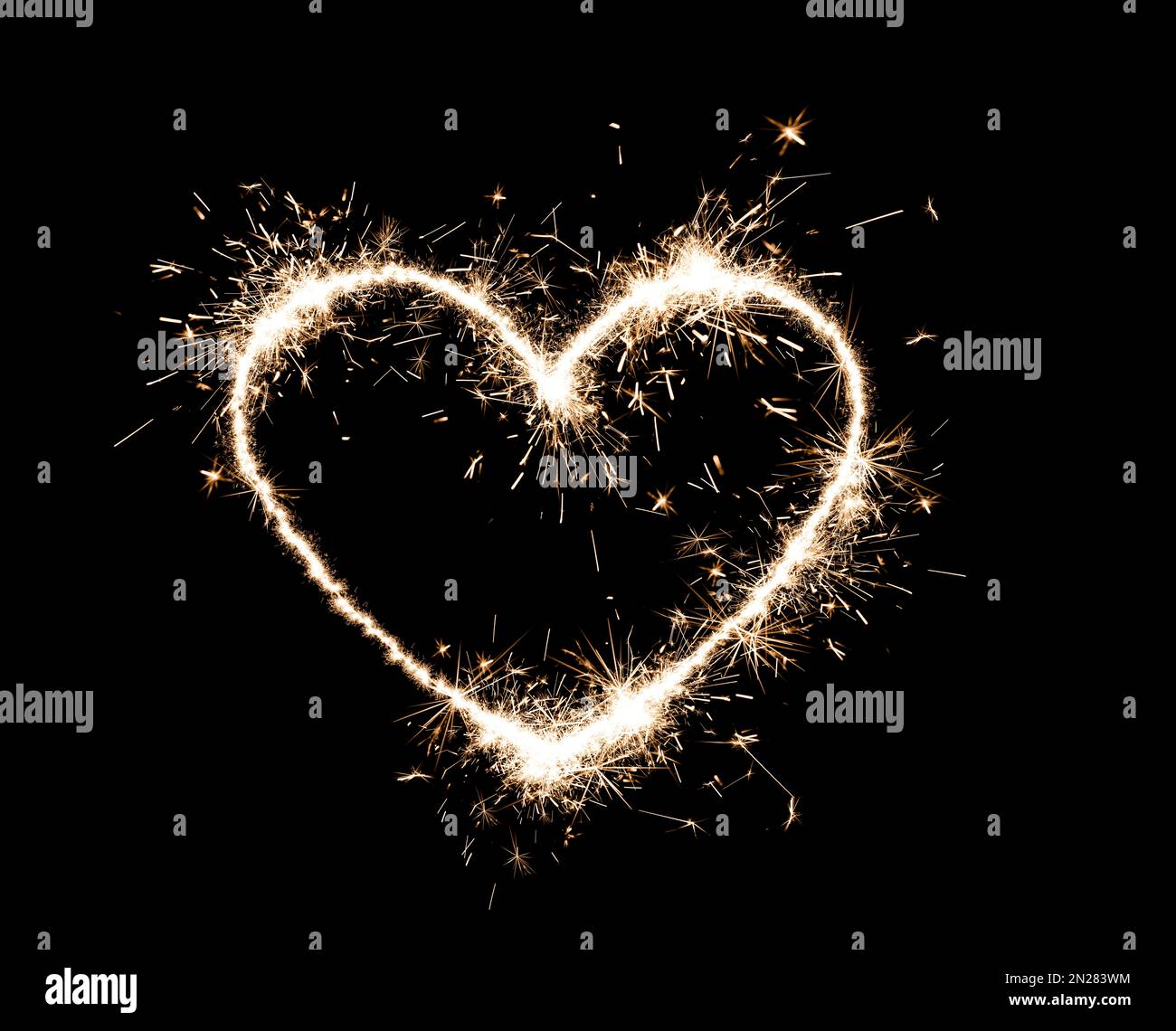 Bright sparkling heart contour on black background Stock Photo - Alamy