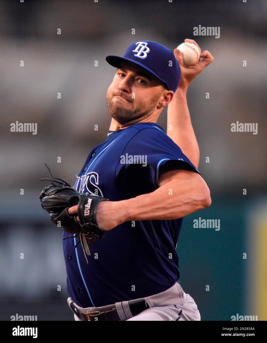 Tampa Bay Rays starting pitcher Nathan Karns throws to the plate during ...