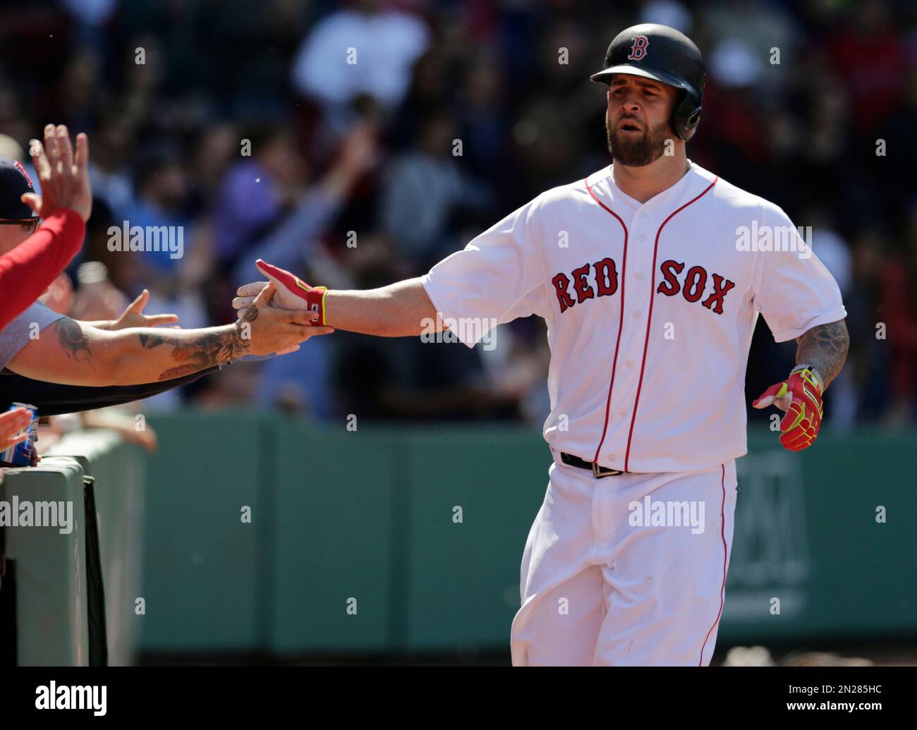 Boston Red Sox Mike Napoli is congratulated after scoring first ...