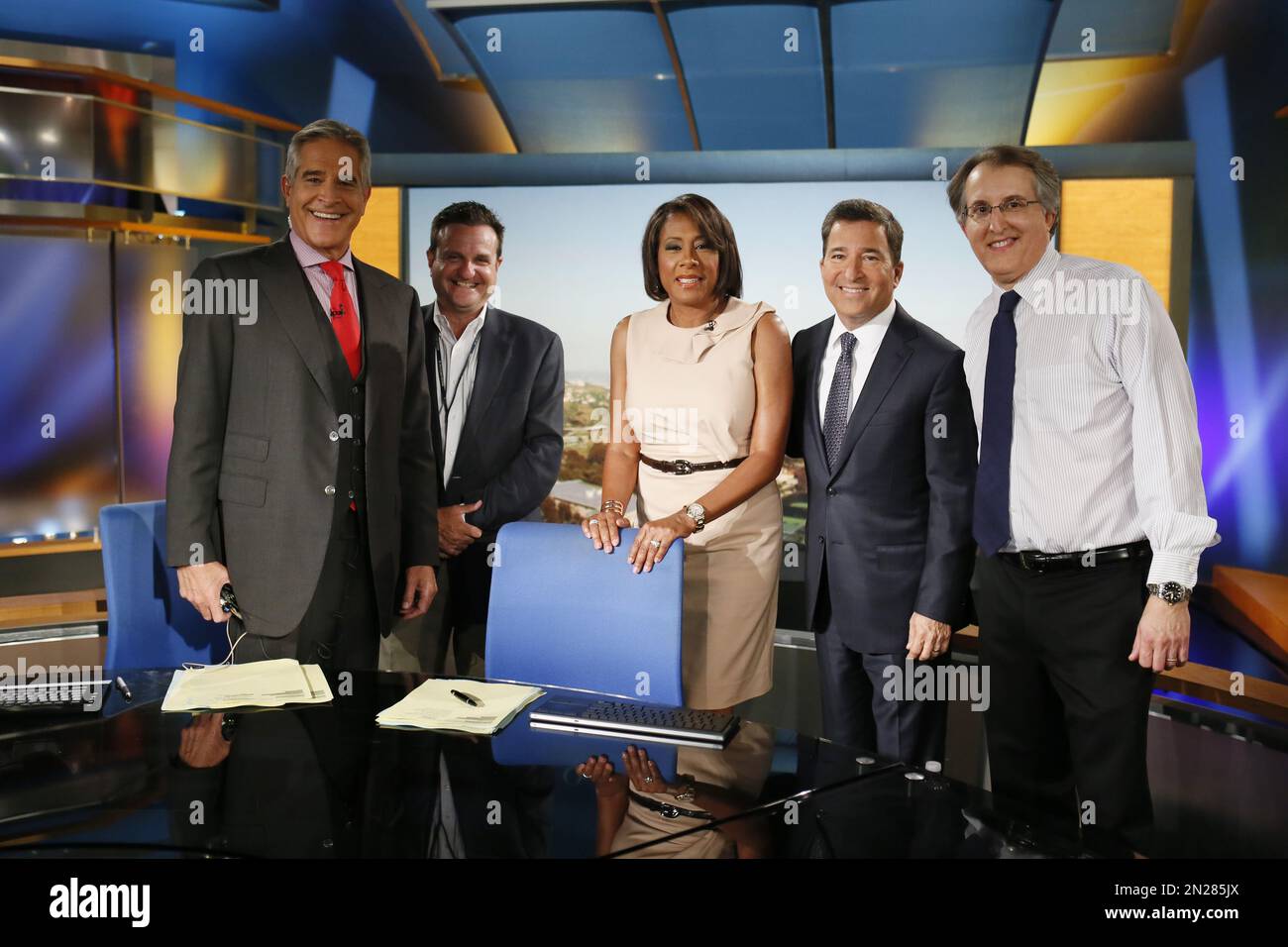 From left to right, news anchor Paul Magers, Vice President & News ...