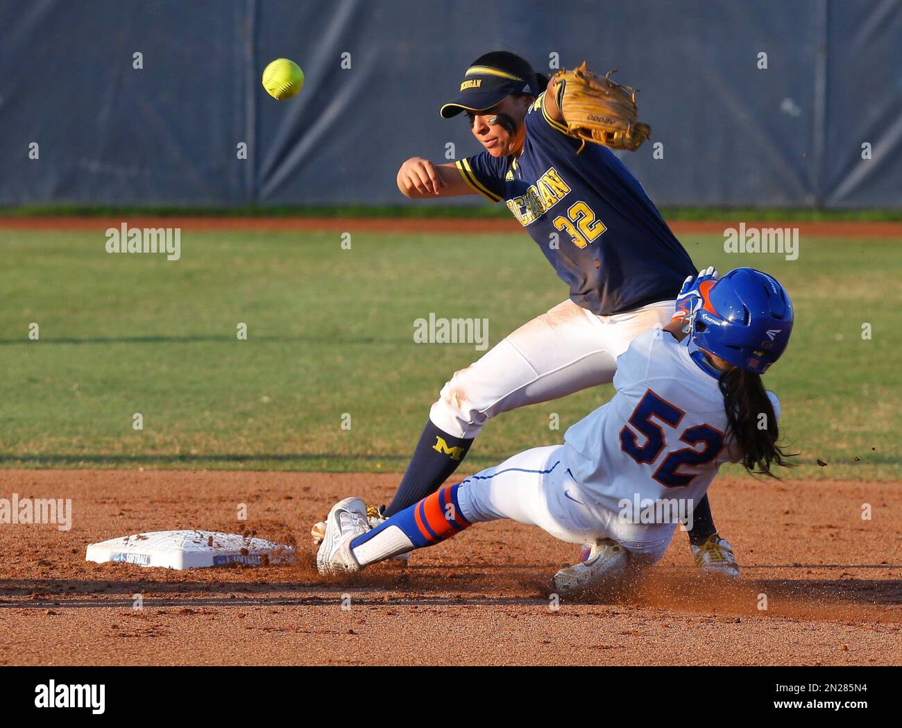 Florida's Justine McLean (52) slides safely into second base as the ...