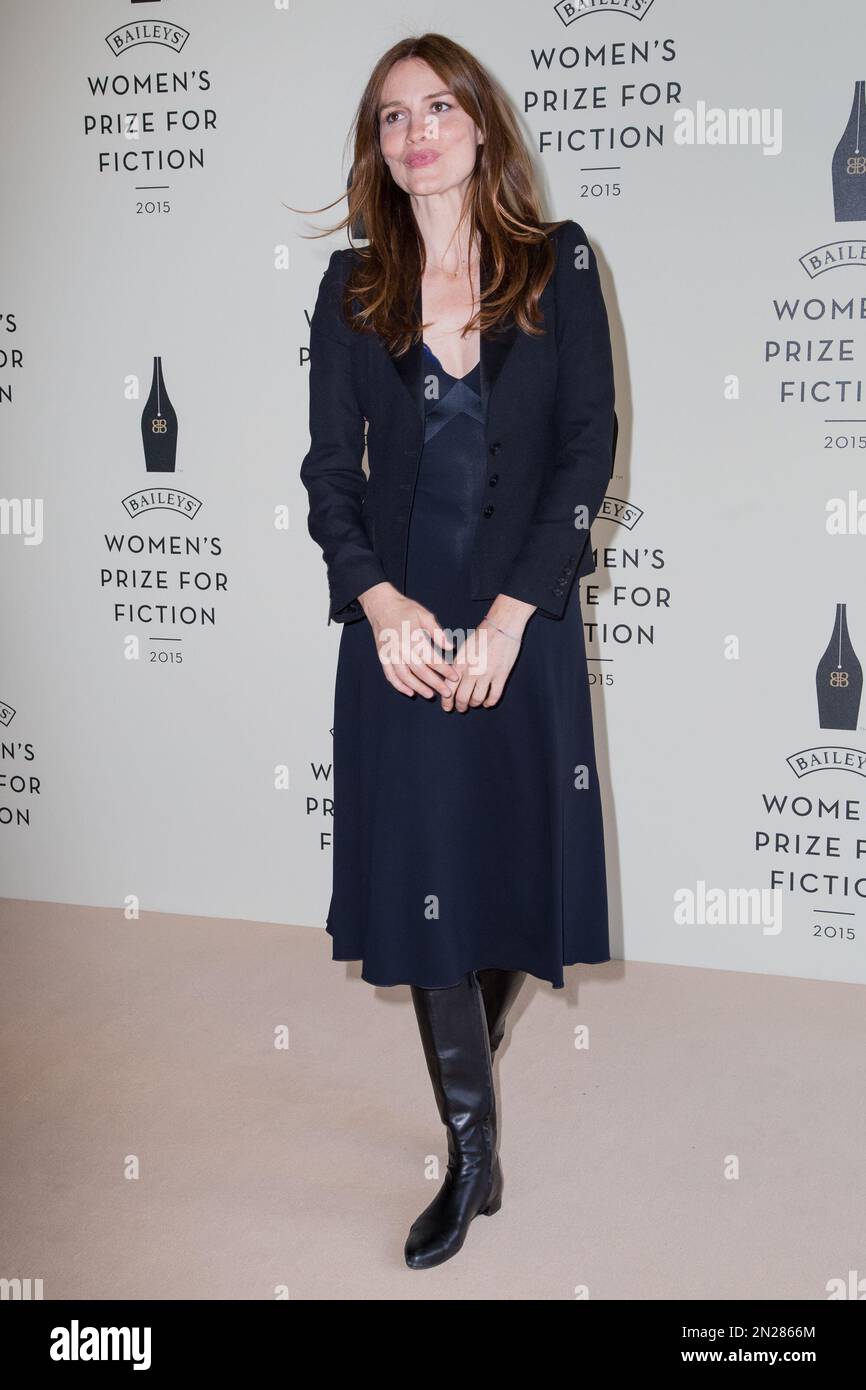 Saffron Burrows poses for photographers upon arrival at the Bailey ...