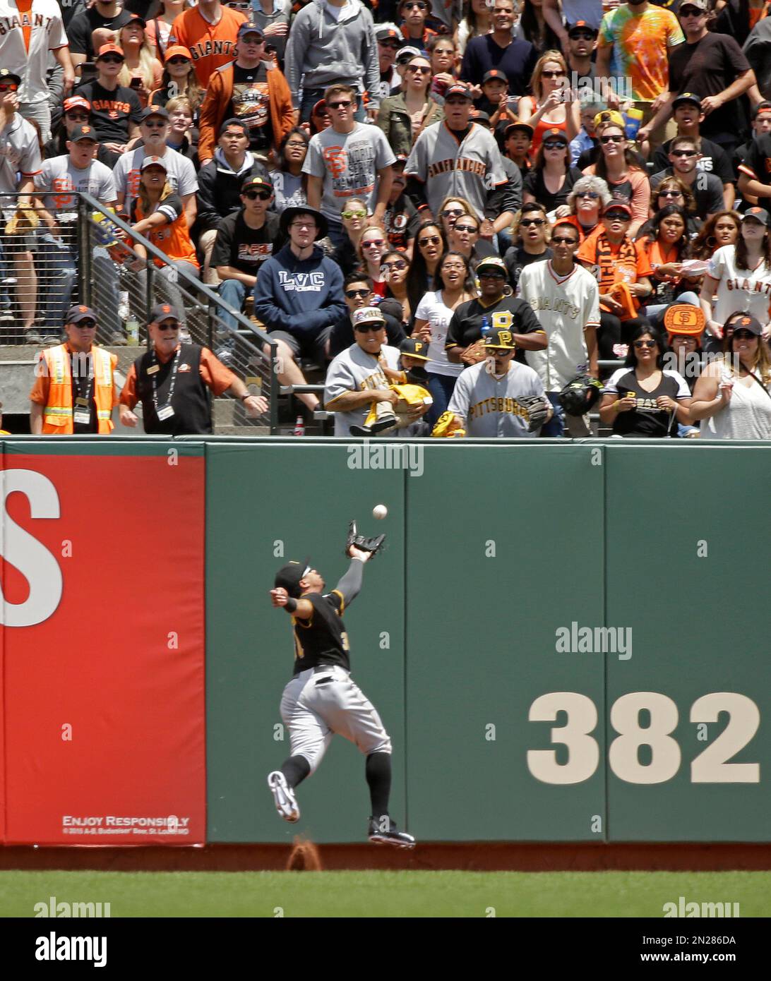 Pittsburgh Pirates left fielder Jose Tabata misses a fly ball hit by ...