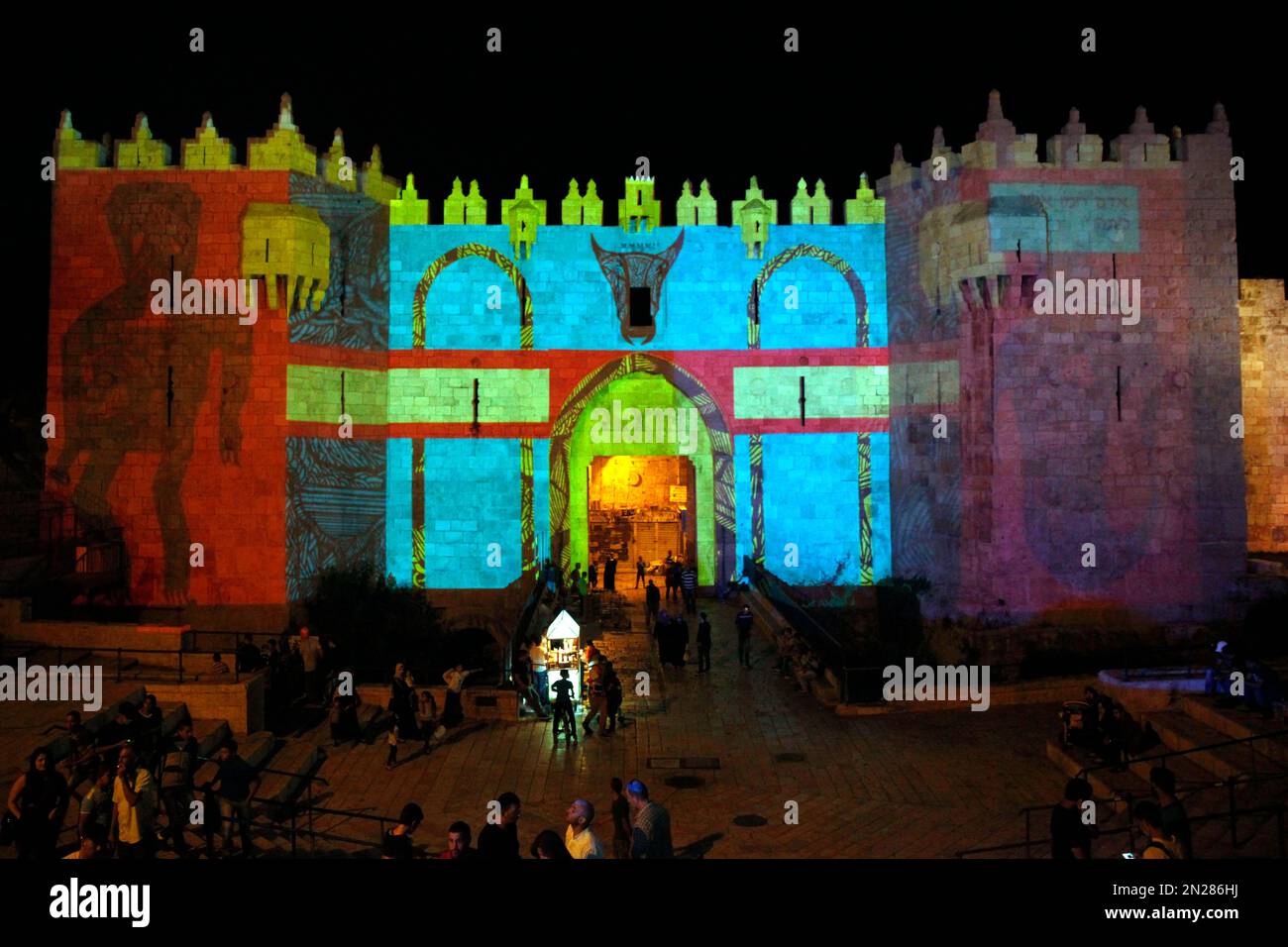 A light installation is projected onto the Damascus gate during a ...