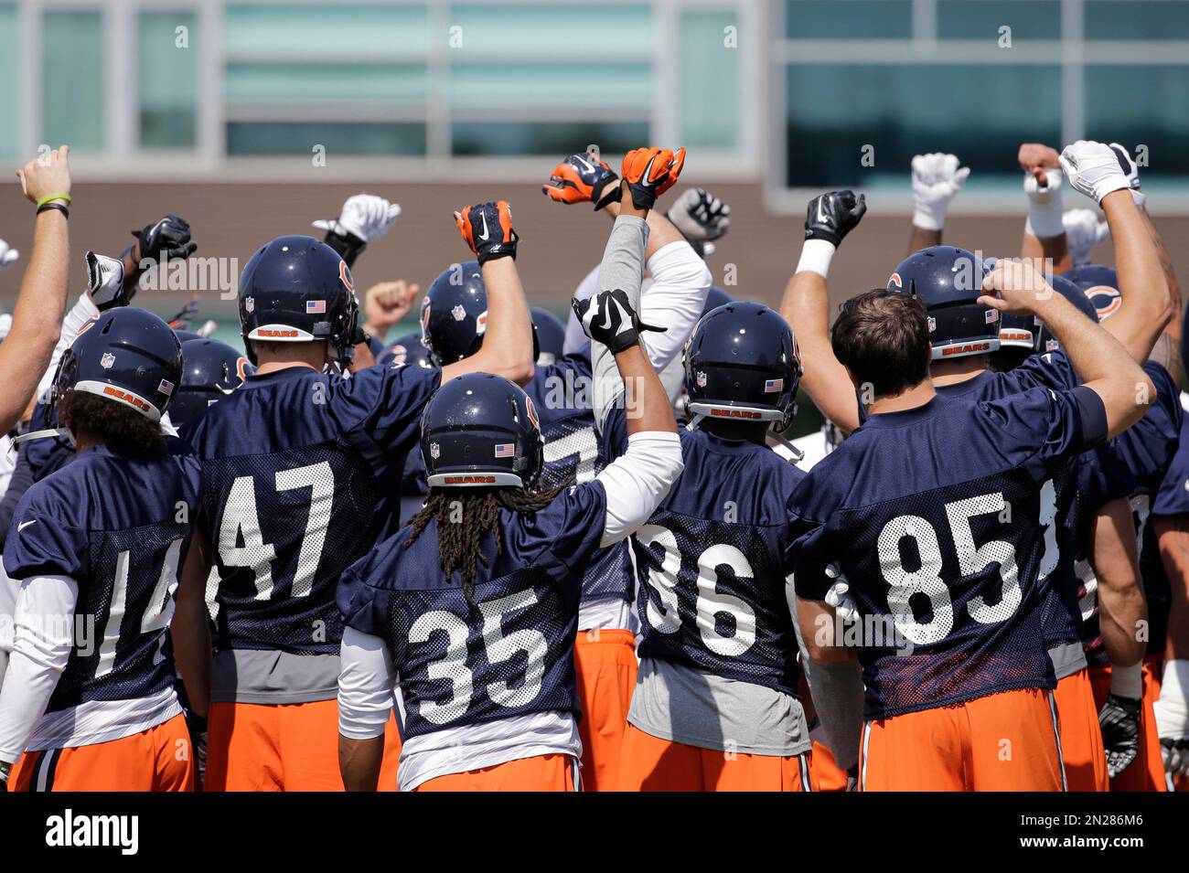 Chicago Bears players cheer for their practice during an NFL football ...