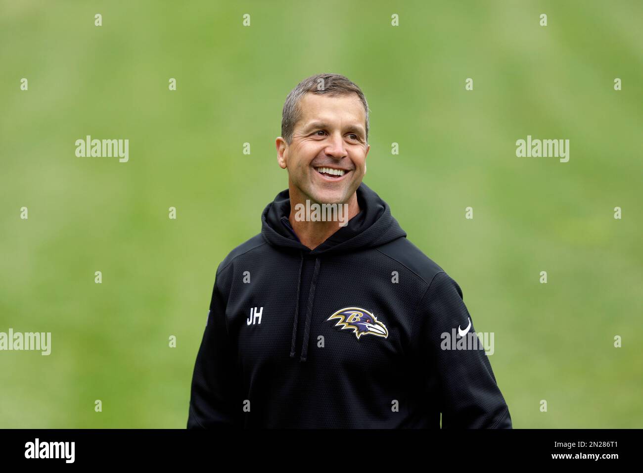 Baltimore Ravens head coach John Harbaugh walks off the field after an ...