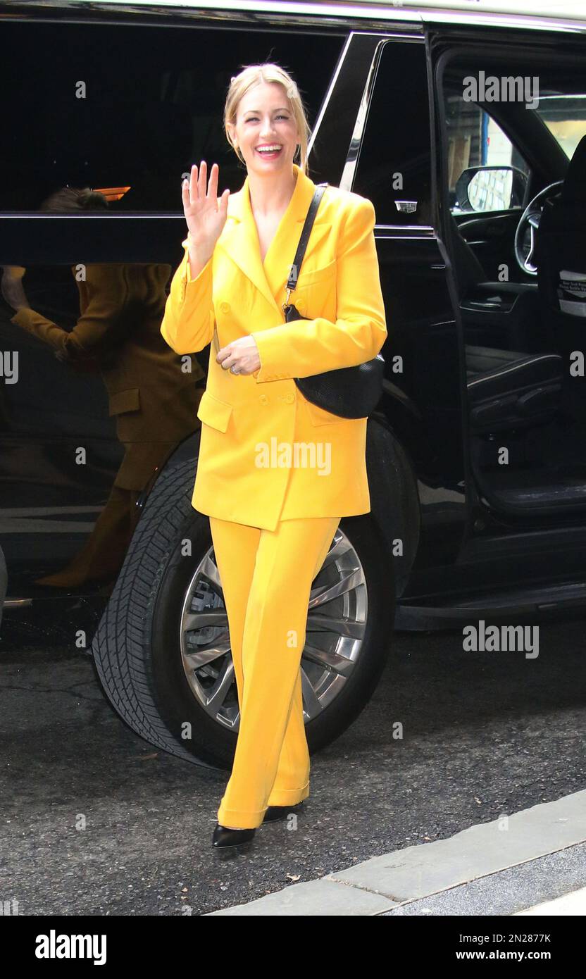 Beth Behrs in a bright, yellow pantsuit at ‘Live with Kelly & Ryan’ in ...