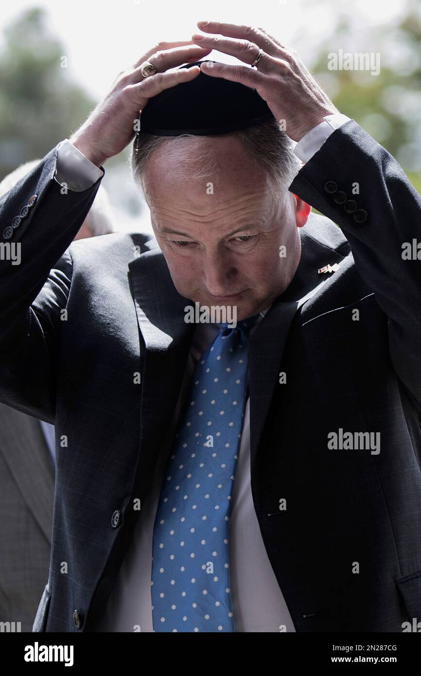 Canada's Foreign Minister Robert Douglas Nicholson puts on a kippa, the ...