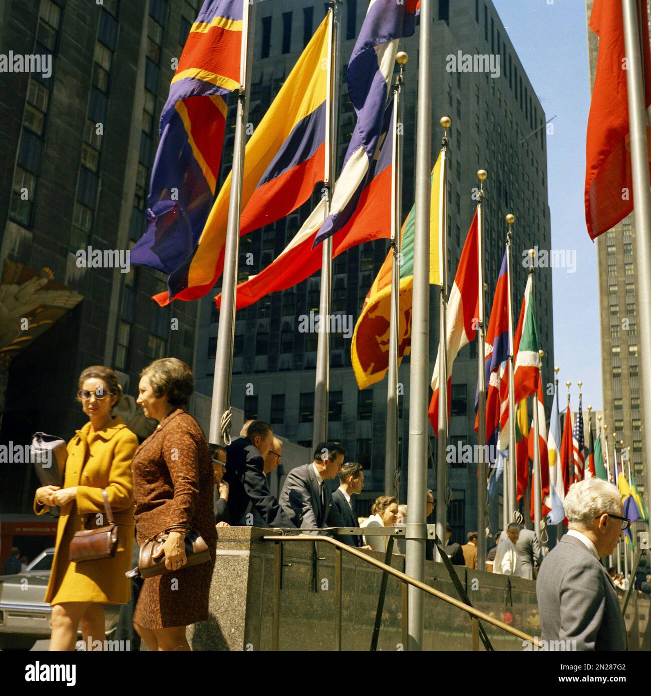 Colorful international flags around the ice skating rink at Rockefeller ...